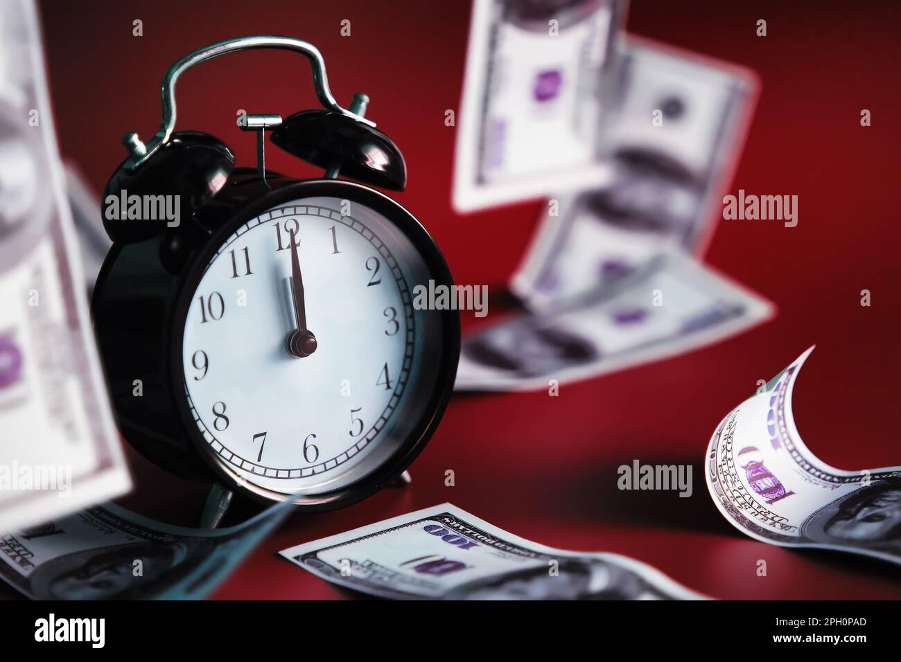 Green dollar bills on a blue background. 100 dollar bills close up. The ...