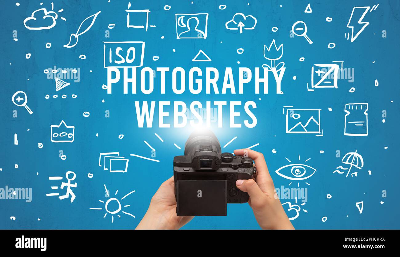 Hand taking picture with digital camera Stock Photo - Alamy