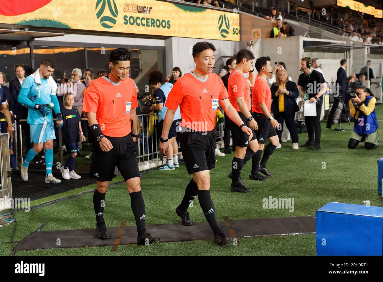 Match referees walk on the field before the match between Australia and ...
