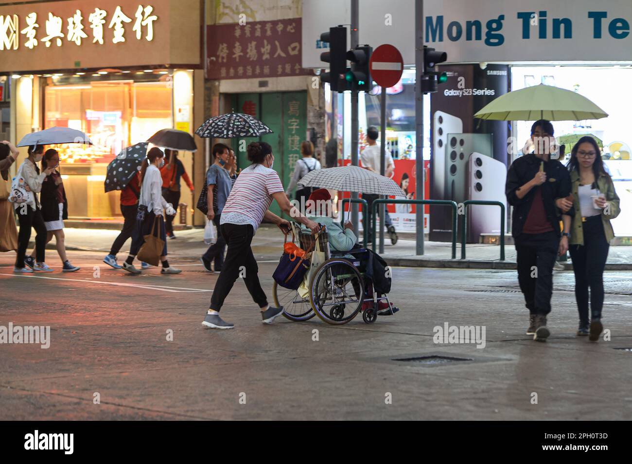Macao, Macao, China. 25th Mar, 2023. A domestic worker pushing ...
