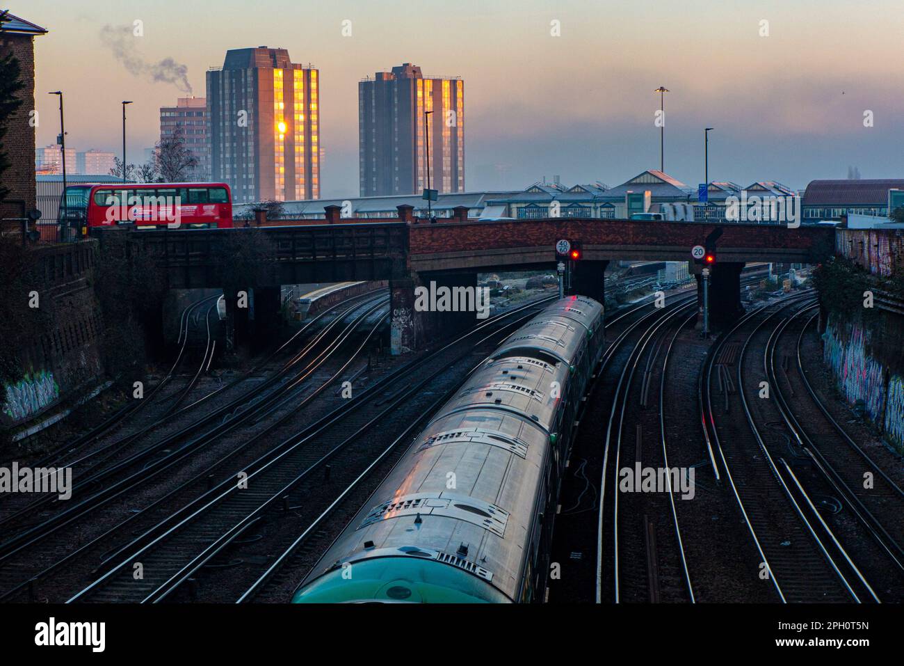 Sunrise reflected on buildings at Clapham Junction station Stock Photo ...