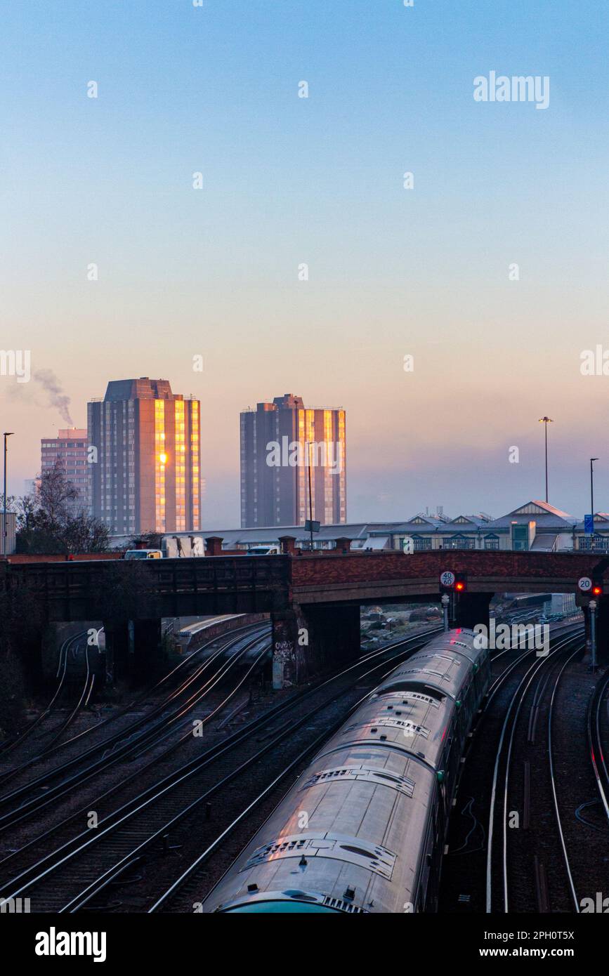 Sunrise reflected on buildings at Clapham Junction station Stock Photo ...