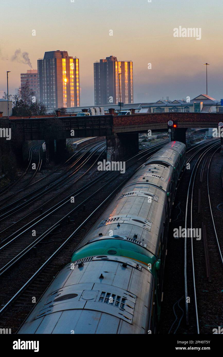Sunrise reflected on buildings at Clapham Junction station Stock Photo ...