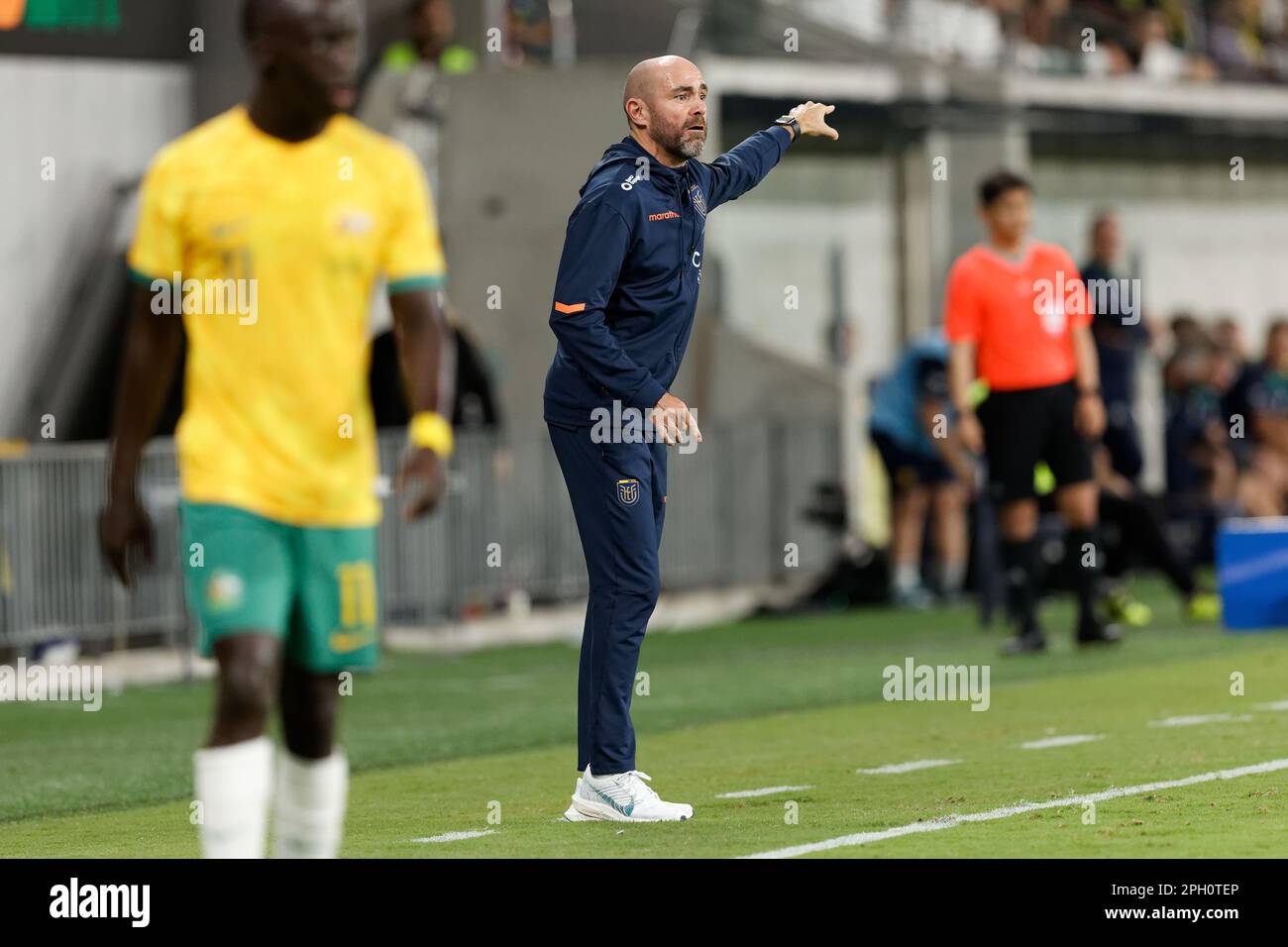 Coach, Félix Sánchez of Ecuador communicates to his players on during ...