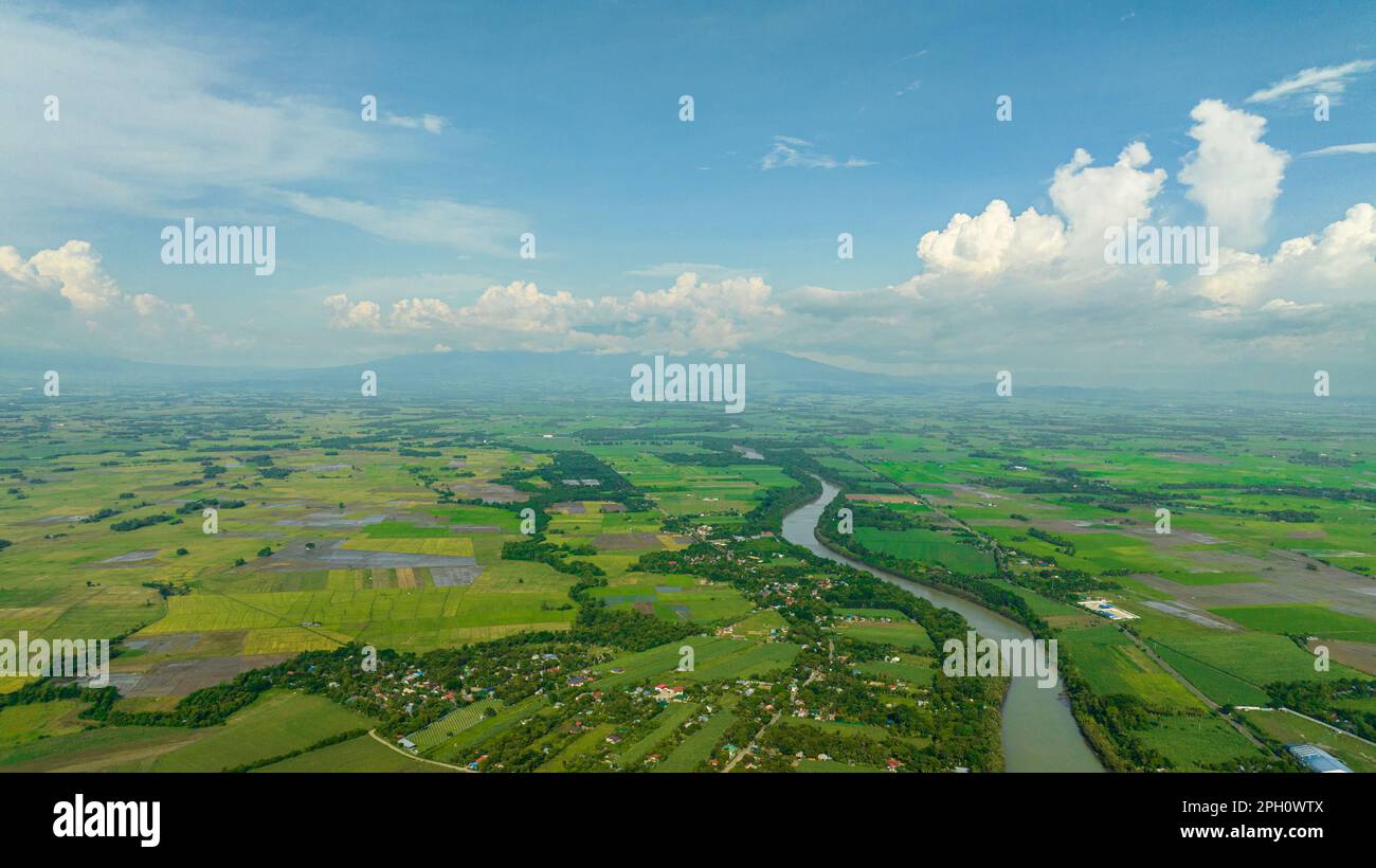 Valley with river and farmland in the countryside. Hinigaran River ...