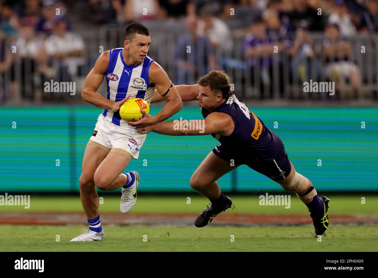 Luke Davies-Uniacke of the Kangaroos is tackled by Sean Darcy of the ...