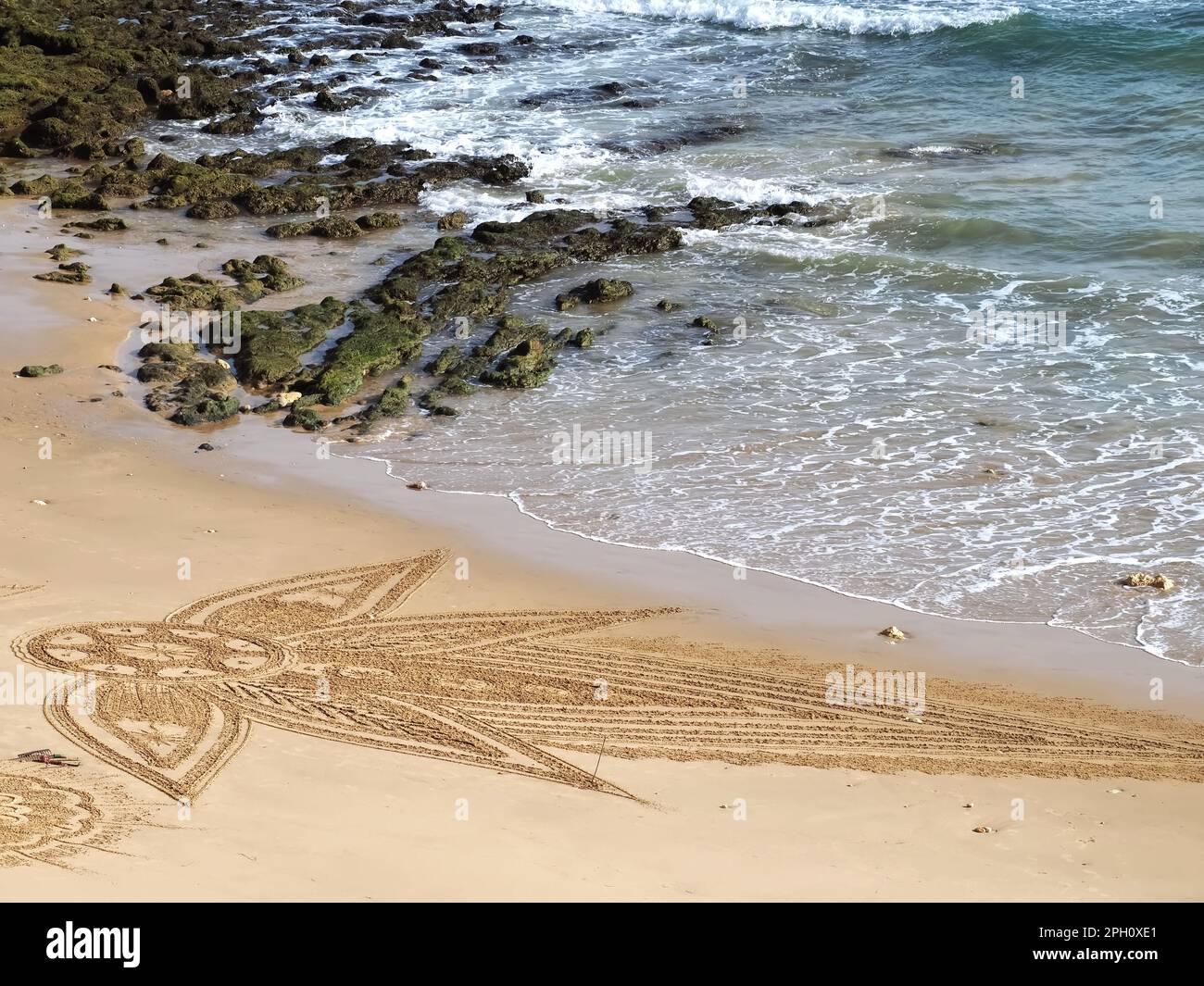 Beautiful beach sand mandala in Albufeira in Portugal Praia Maria Luisa ...