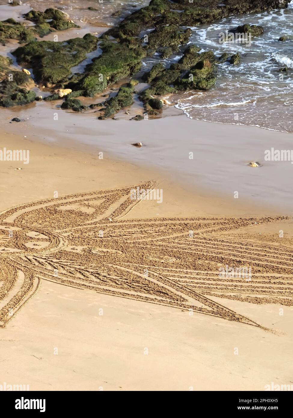 Beautiful beach sand mandala in Albufeira in Portugal Praia Maria Luisa ...