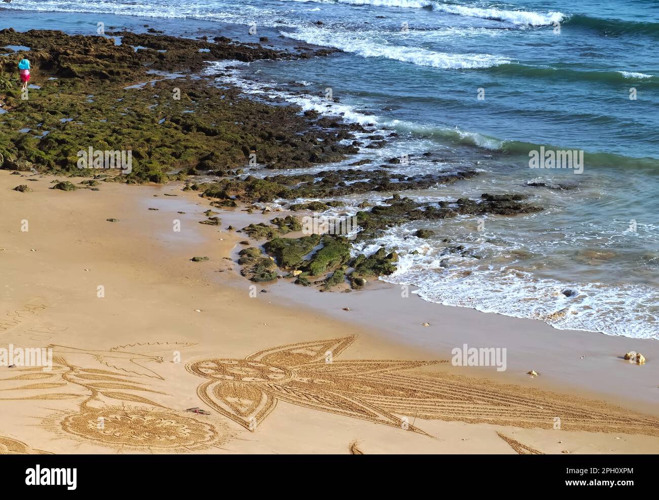 Beautiful beach sand mandala in Albufeira in Portugal Praia Maria Luisa ...