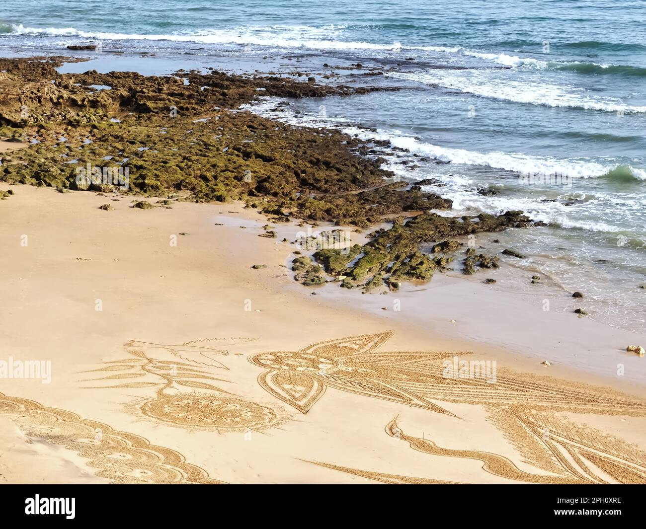 Beautiful beach sand mandala in Albufeira in Portugal Praia Maria Luisa ...