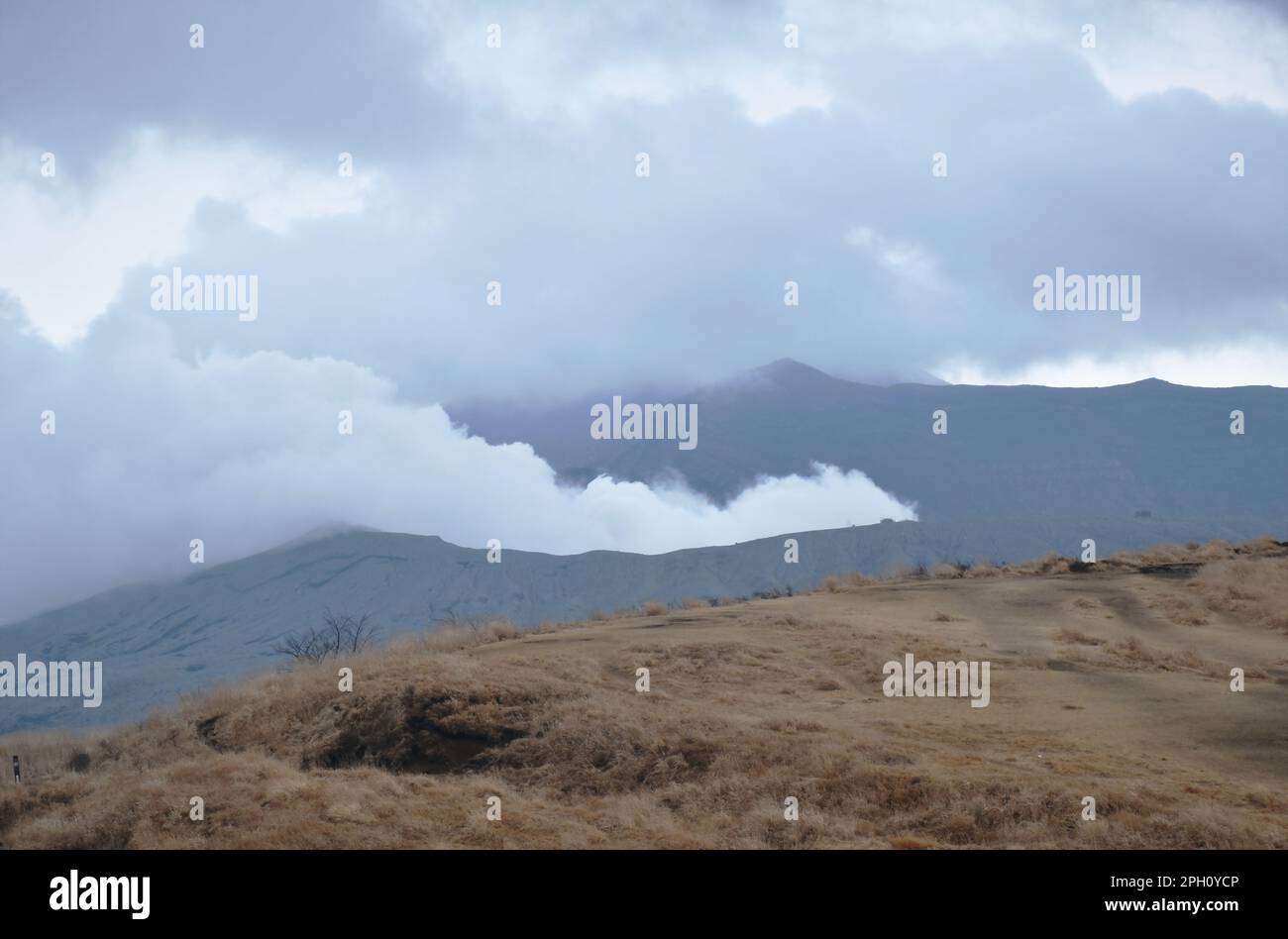 Kusasenri grass field and mountain with active volcanoes travel ...