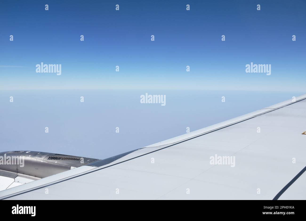 plane wing and cloud floating on sky through window frame Stock Photo ...