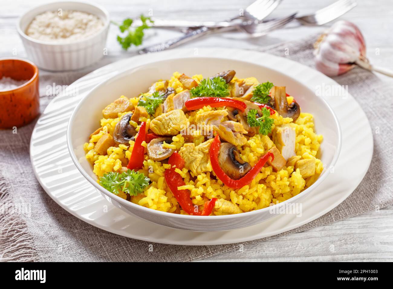 Chicken Paella of arborio rice, chicken fillet, mushrooms, julienned ...
