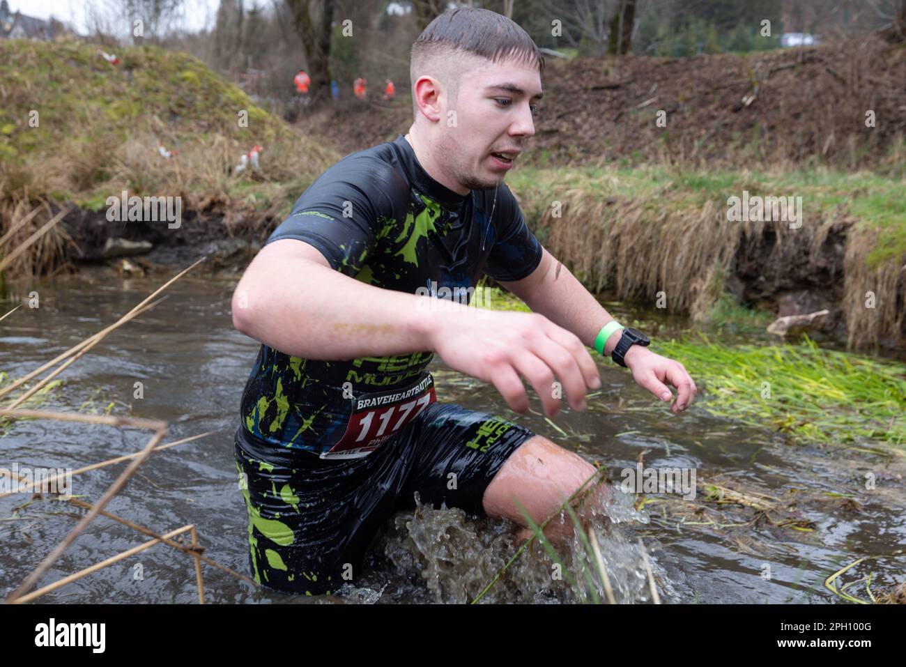 Steinach, Germany. 25th Mar, 2023. A participant of the obstacle race ...