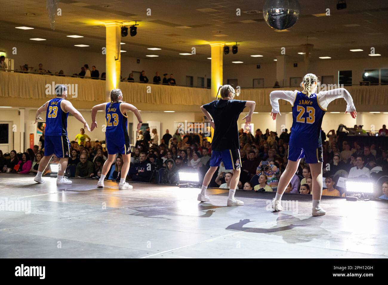 25 March 2023, Lower Saxony, Hanover: Members of the group "XI" dance ...