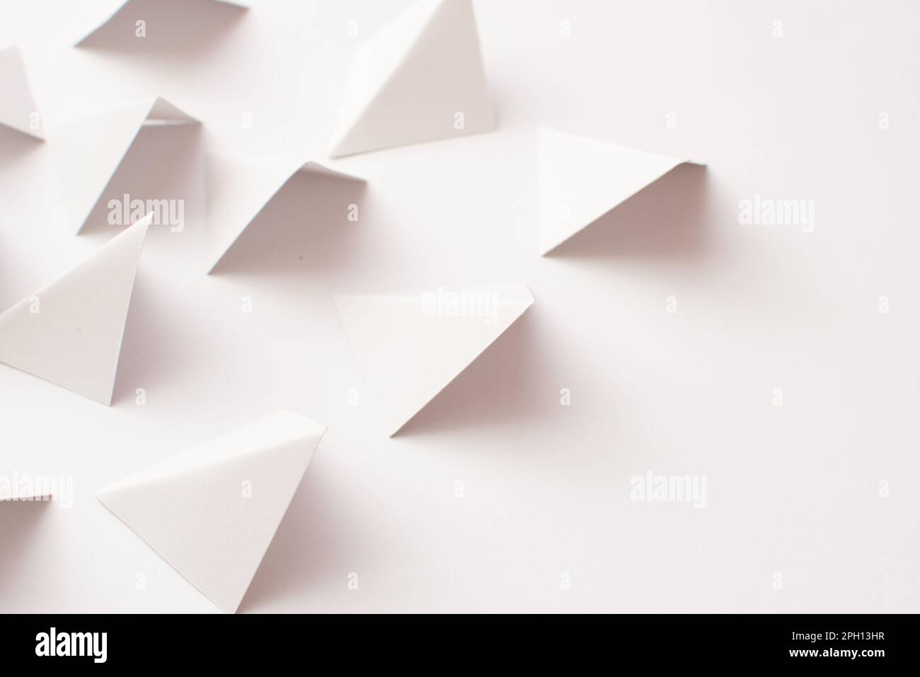 Abstract white background with 3d white triangle shapes Stock Photo - Alamy