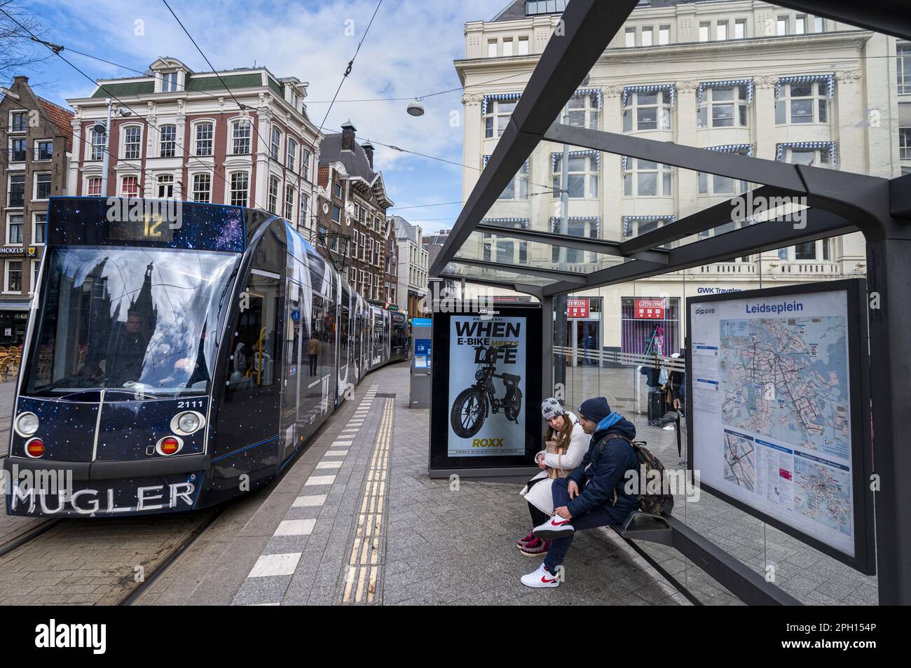 AMSTERDAM - Tram 12 in the center of Amsterdam. Public transport in the ...