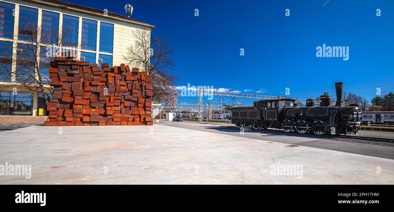 Holocaust memorial and coal steam locomotive on Zagreb central rail ...