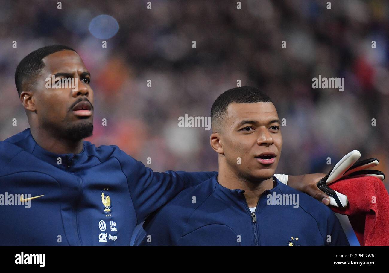 Saint Denis, France. 24th Mar, 2023. Mike Maignan and Kylian Mbappé of France during the UEFA ...