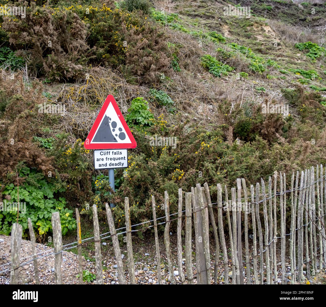 Cliff erosion sign warning beach goers of the dangers on Dunwich beach ...
