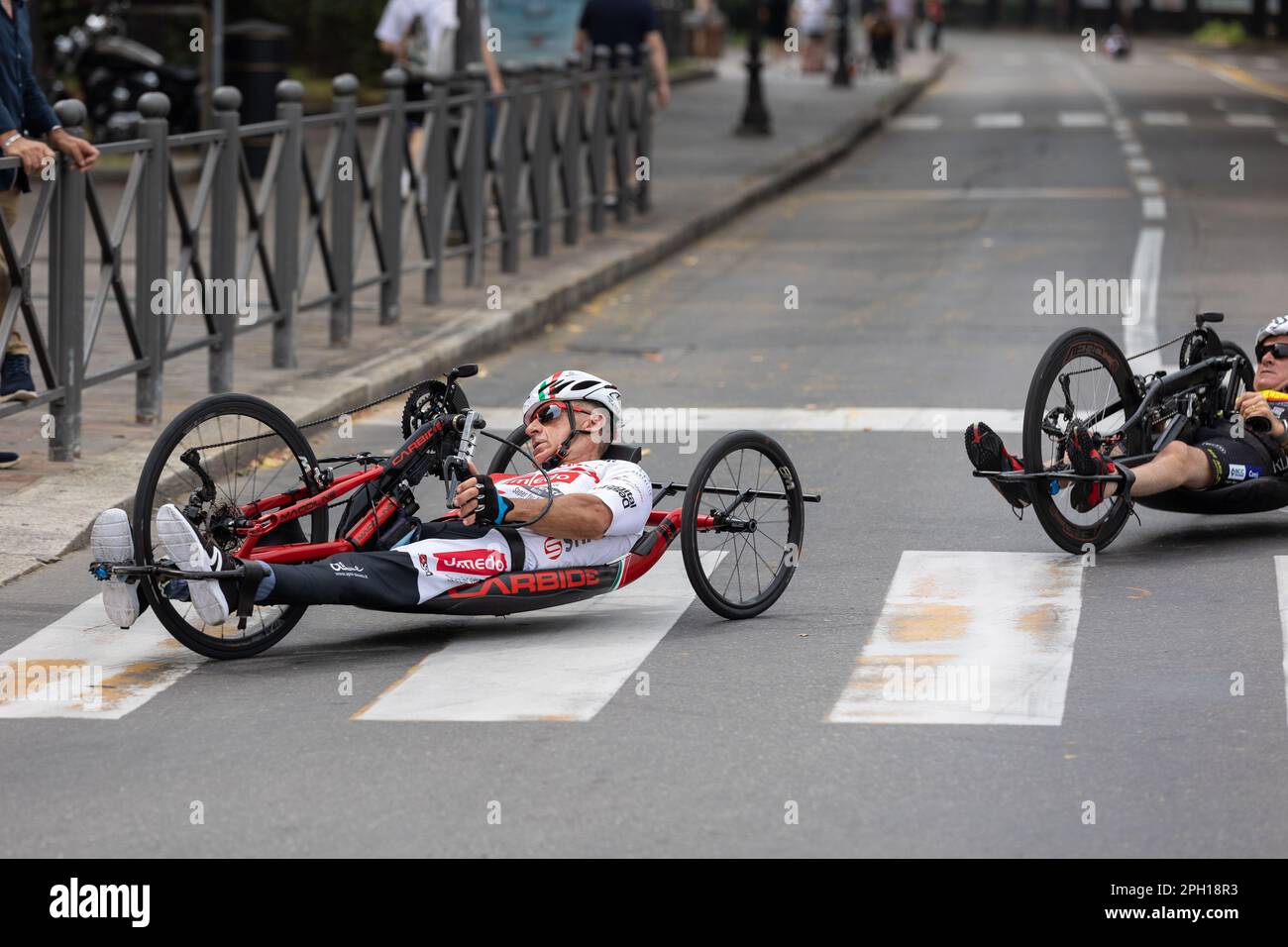 Couple of Athletes training with Their Special Bikes on a City Track ...