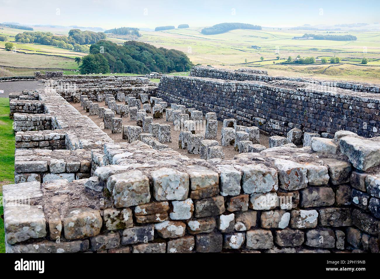 A ruined Roman fort on Hadrian's wall Northumbria Stock Photo - Alamy