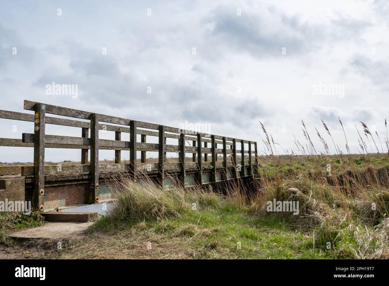 Bridge over the river on the Suffolk Coast Path Stock Photo - Alamy