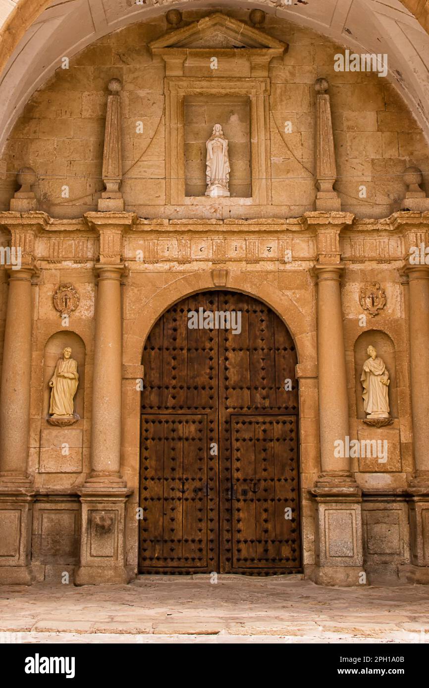 Entrance door of the main church in the small town of El Toboso (Spain ...