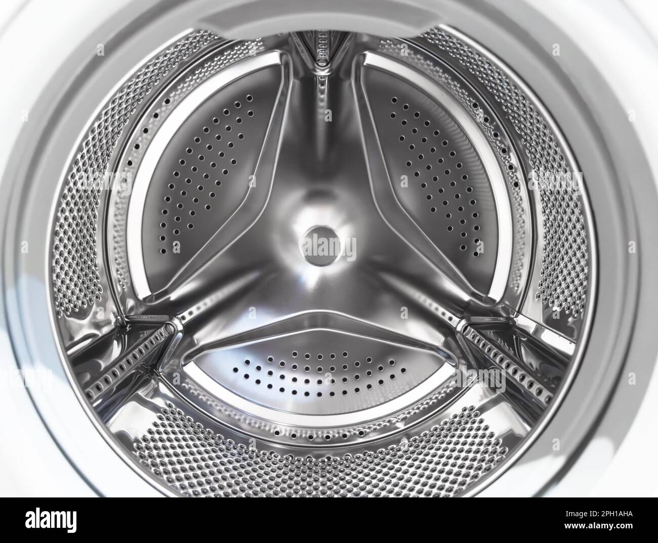 Washing machine drum close up. Washing machine background. Inside the ...