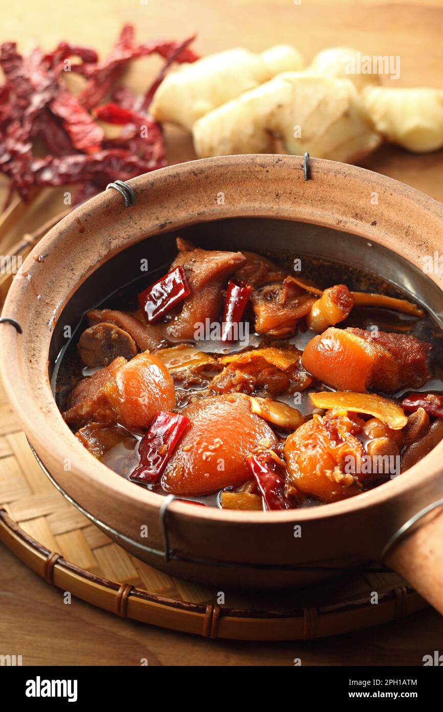 Asian cuisine claypot black vinegar pig’s trotter Stock Photo - Alamy