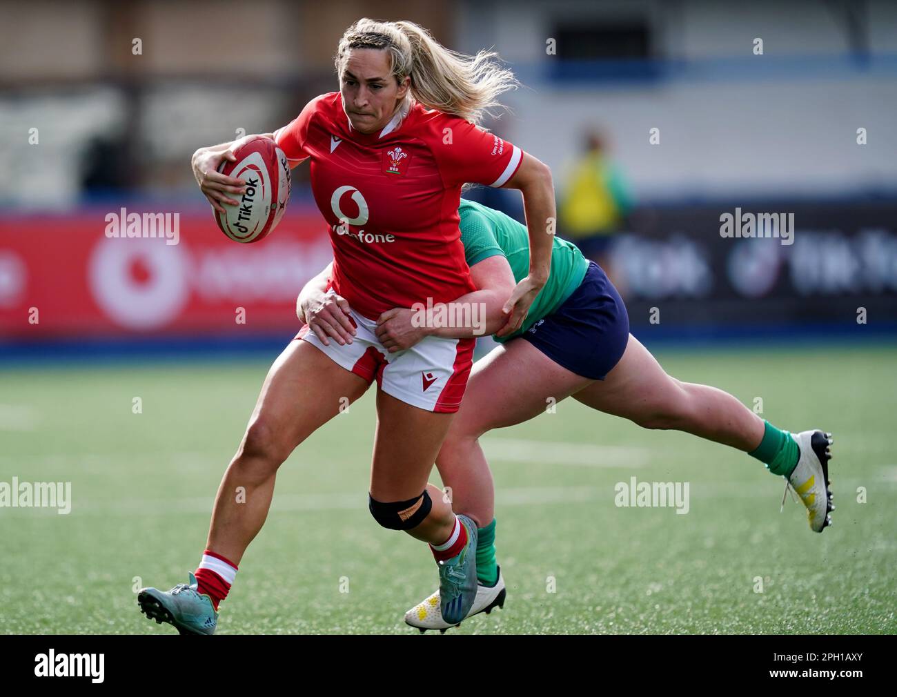Wales' Courtney Keight (right) is tackled by Ireland's Enya Breen ...