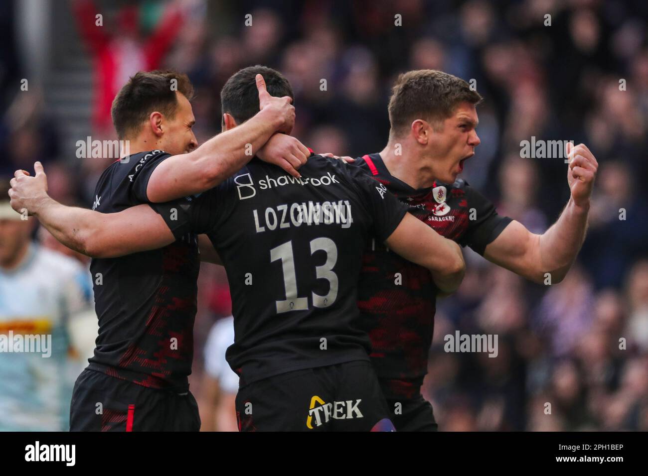 Saracens' Alex Lozowski celebrates after scoring a try with Ivan Van ...
