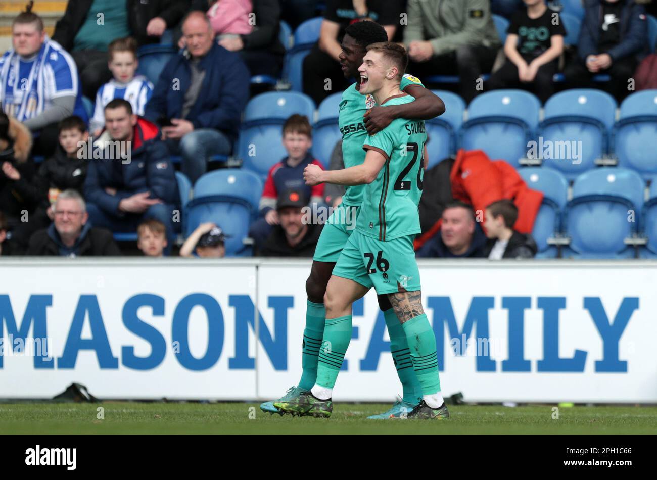 Harvey Saunders of Tranmere Rovers celebrates with team-mate Joel ...