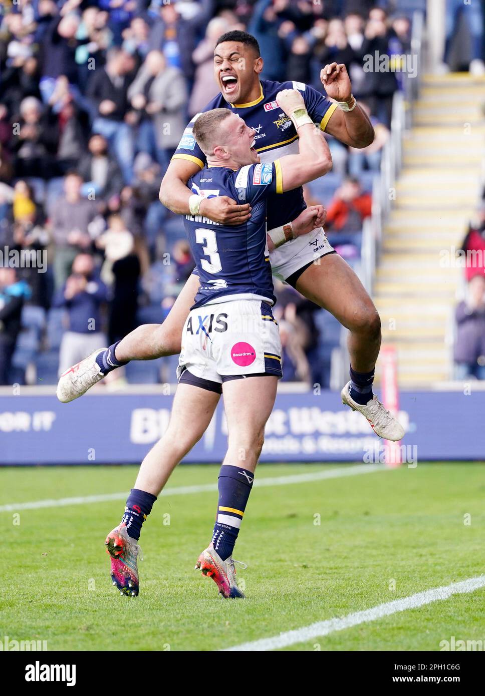 Leeds Rhinos' Harry Newman (left) celebrates with David Fusitua after ...