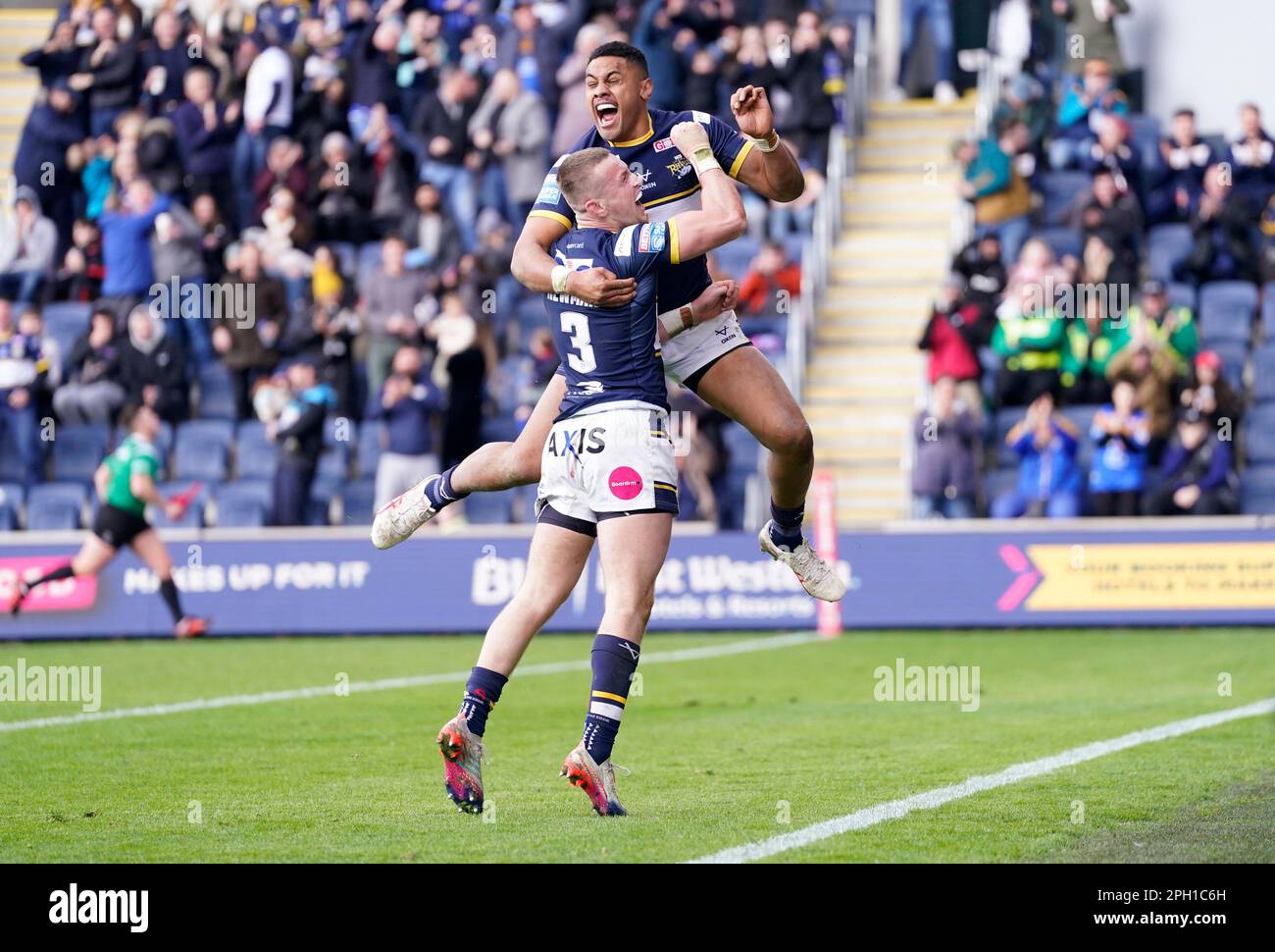 Leeds Rhinos' Harry Newman (left) celebrates with David Fusitua after ...