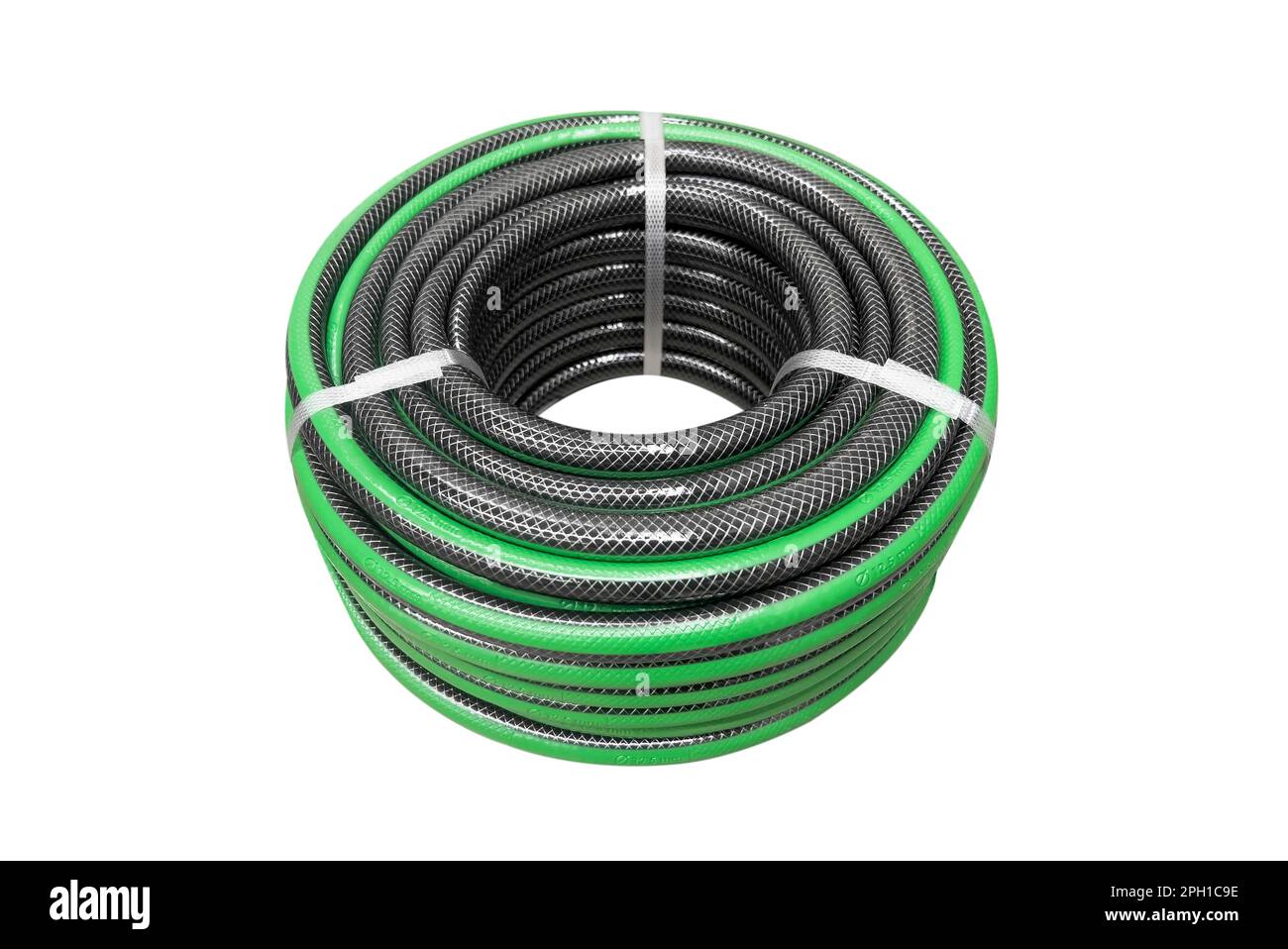 New curled garden hose isolated on white background. Rubber watering ...