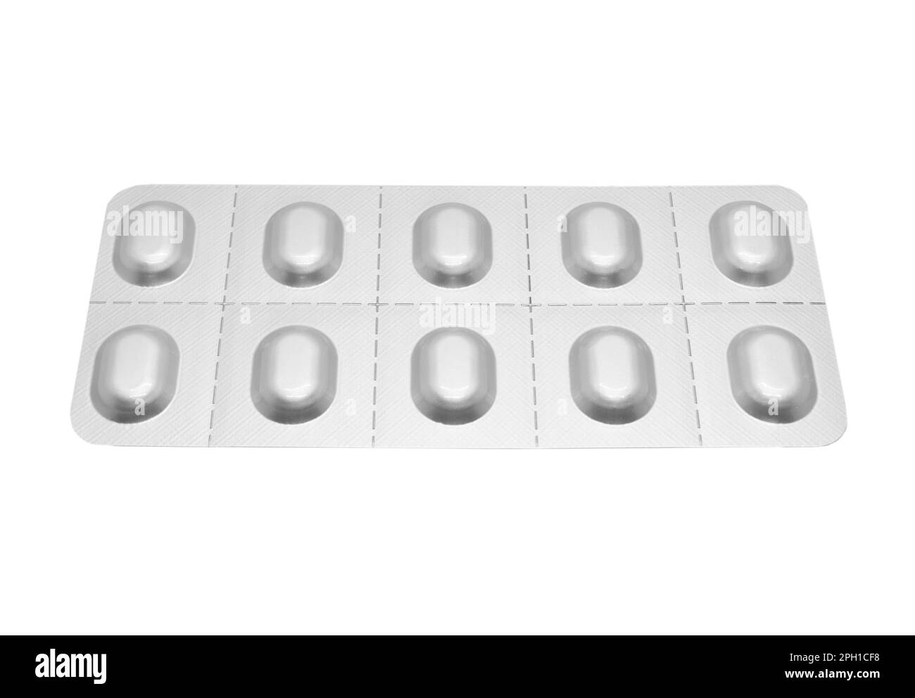 Macro shot pile of tablets pill in silver blister packaging isolated on ...