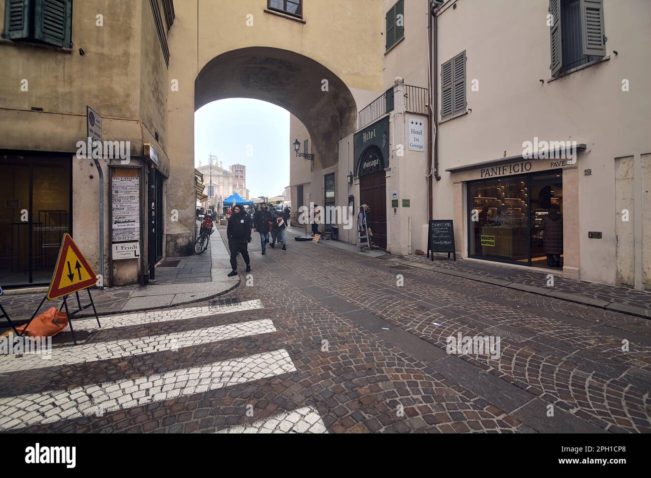 Covered alley in a historic building in an italian town Stock Photo - Alamy