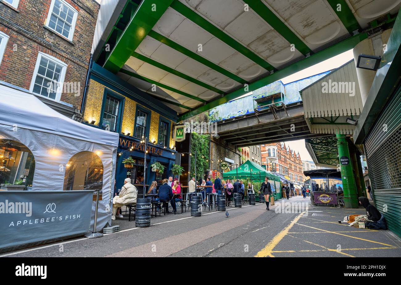 London, UK: Stoney Street next to Borough Market with railway bridges ...