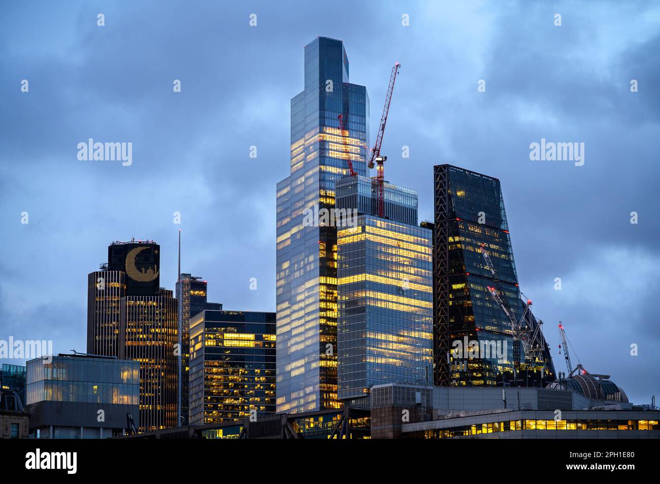 London, UK: Skyscrapers of the City of London at dusk with Tower 42, 22 ...