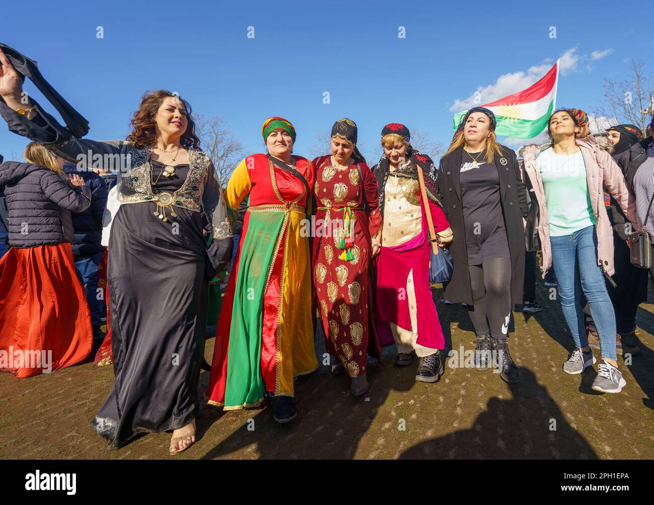 25 March 2023, Hesse, Frankfurt/Main: Women in traditional dress dance ...