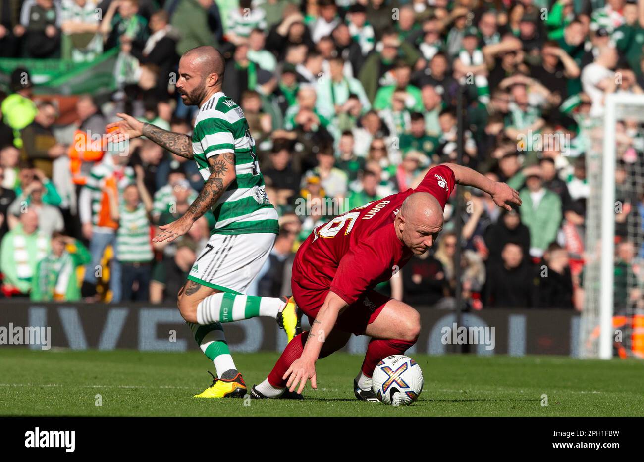 Celtic Legends Marc Cross against Liverpool Legends Charlie Adam during ...