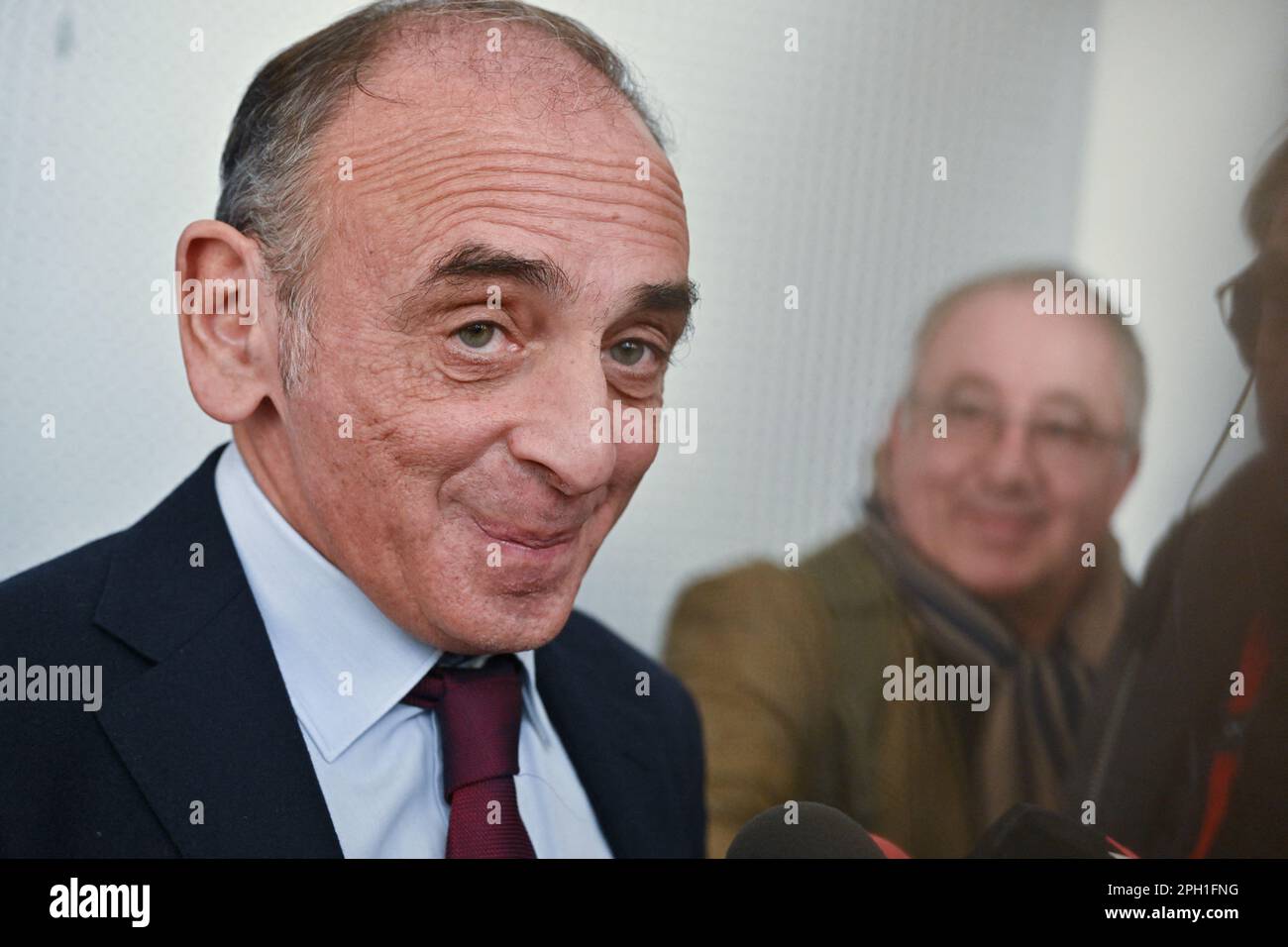 Eric Zemmour, president of the far right party Reconquete, signs ...