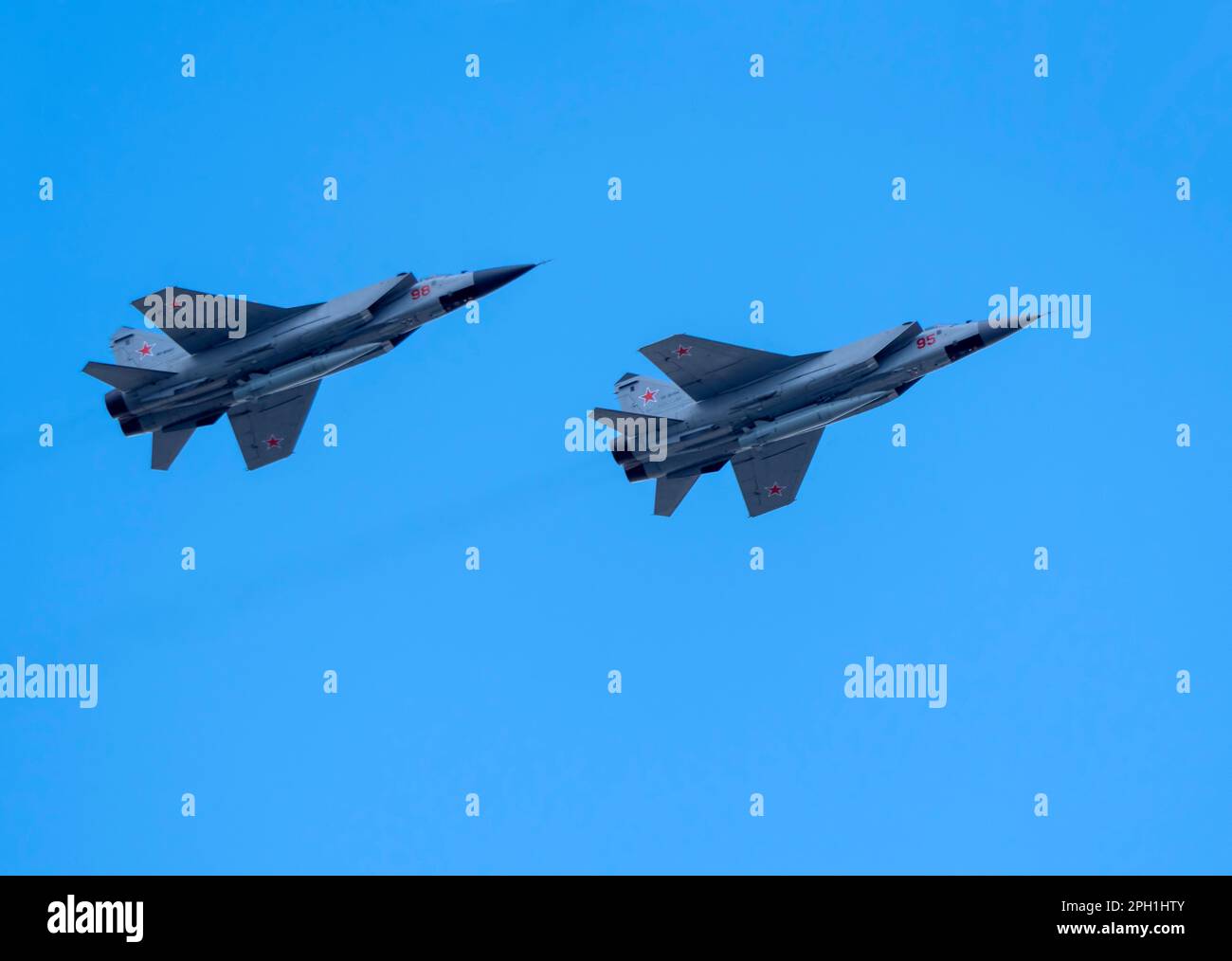 MOSCOW, RUSSIA - MAY 7, 2021: Avia parade in Moscow. group jet fighter aircraft Mikoyan MiG-31 ...