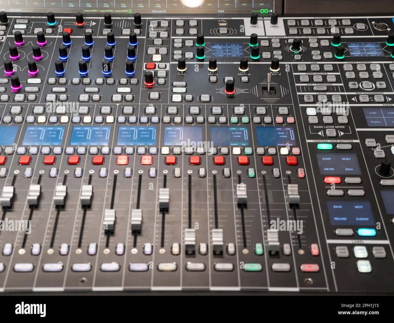 Sound audio mixer of sliders and buttons on a console with connected ...