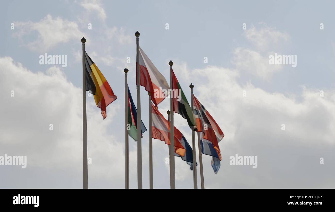 Various national flags with the EU flag under a blue sky Stock Photo ...