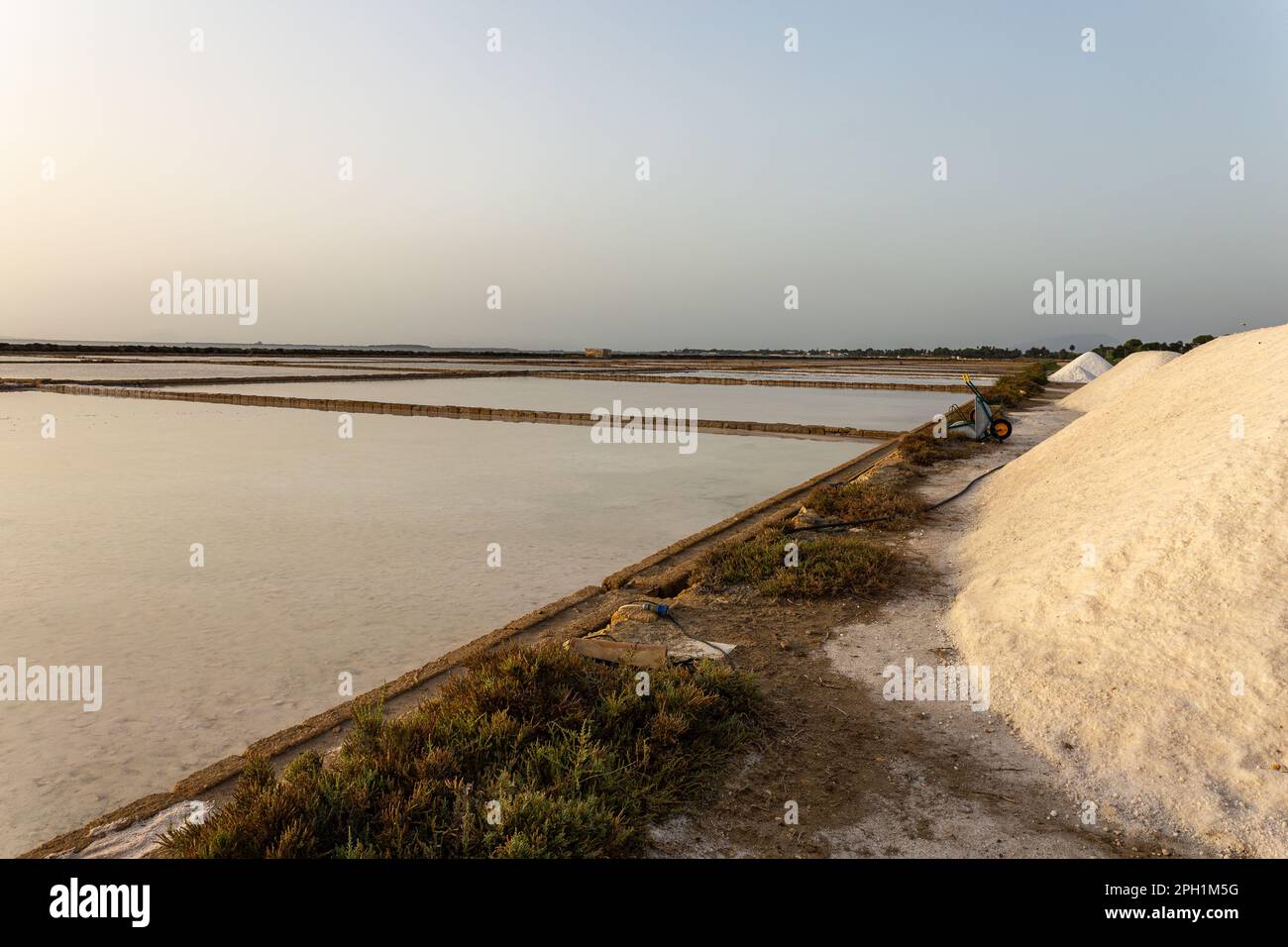 The coastal landscape of west Sicily is dotted with traditional salt ...