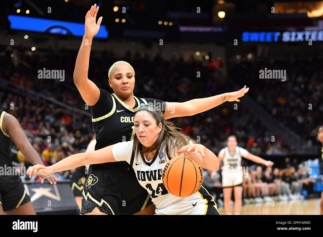 March 24, 2023: Iowa Hawkeyes forward McKenna Warnock (14) drives the ...