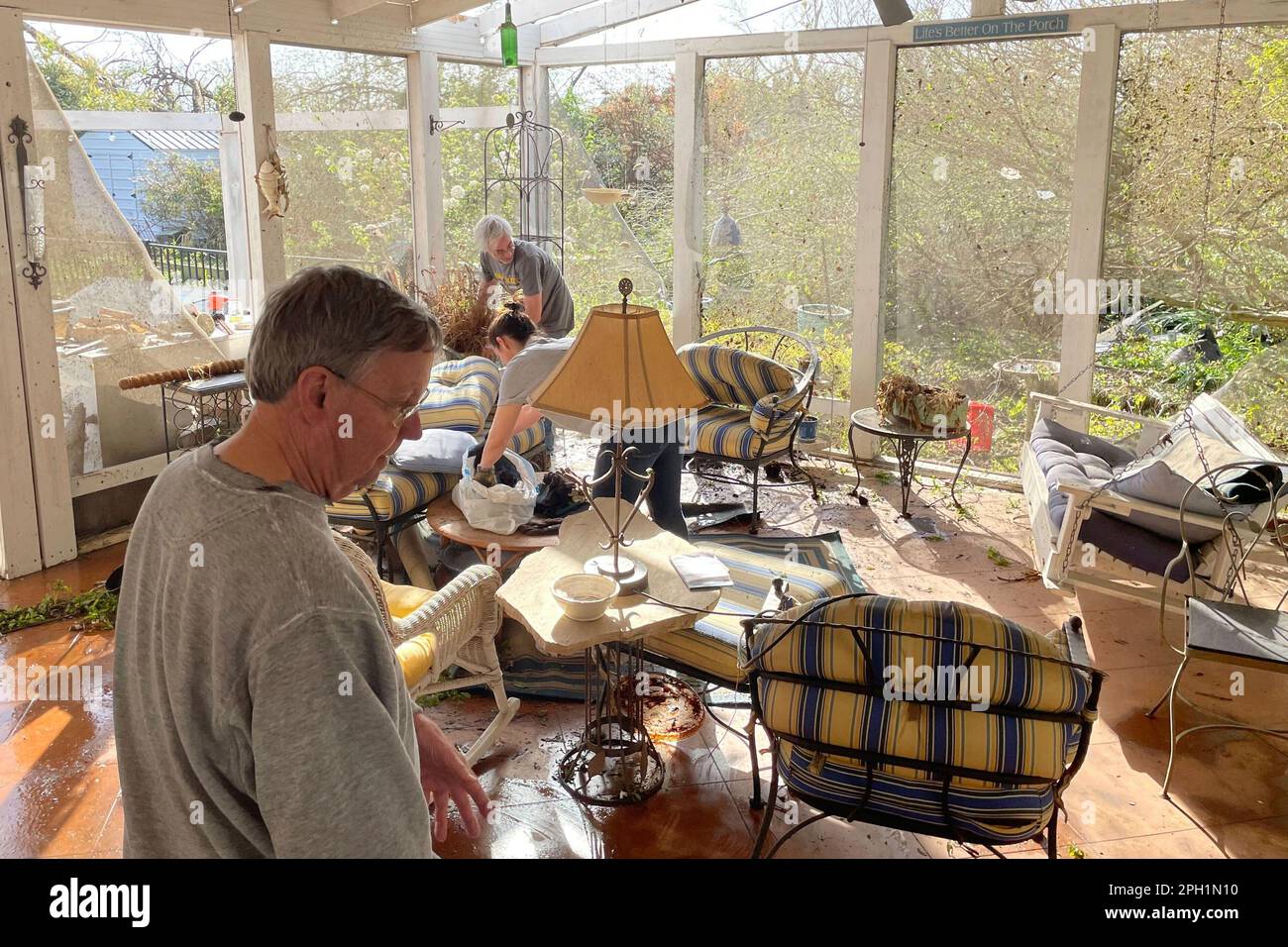 Noel Crook looks through damage at his home in Silver City, Miss., on ...