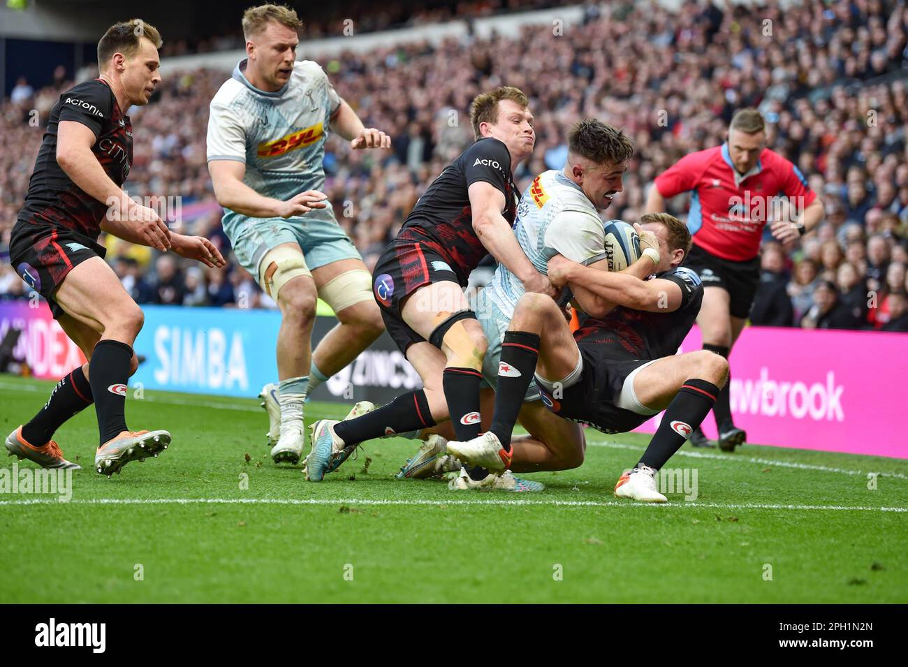 London, UK. 25th Mar, 2023. Cadan Murley of Harlequins driving for line ...